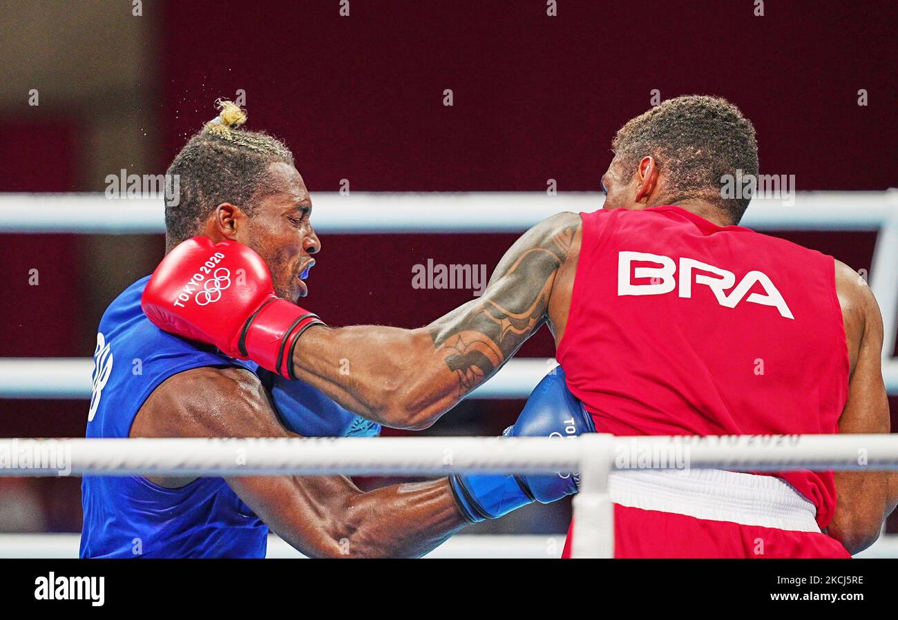 Julio La Cruz from Cuba and Abner Teixeira from Brazil during boxing at the Tokyo Olympics at ...
