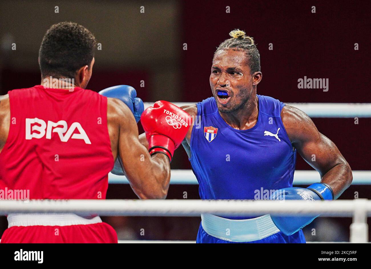 Julio La Cruz from Cuba and Abner Teixeira from Brazil during boxing at ...