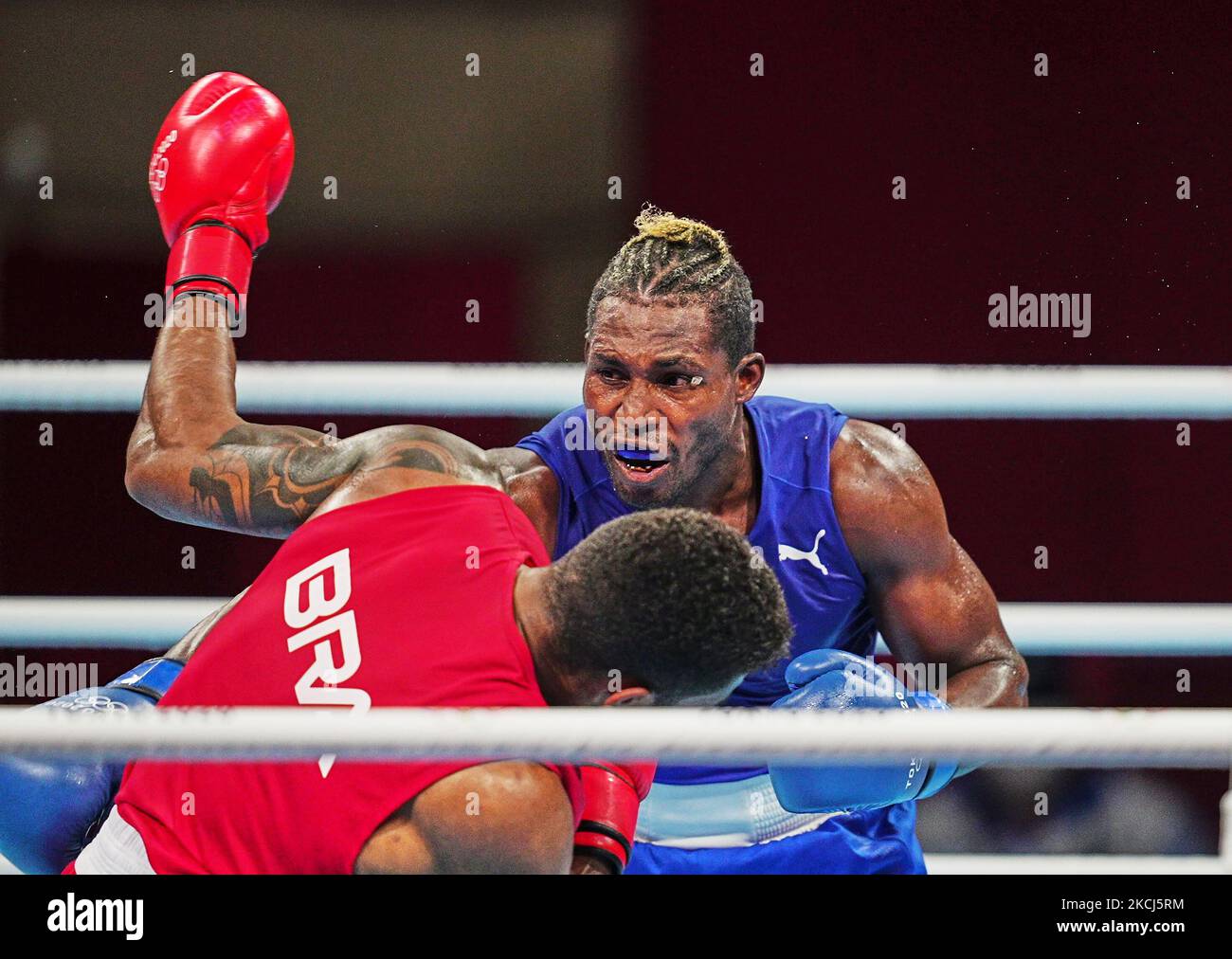 Julio La Cruz from Cuba and Abner Teixeira from Brazil during boxing at the Tokyo Olympics at ...