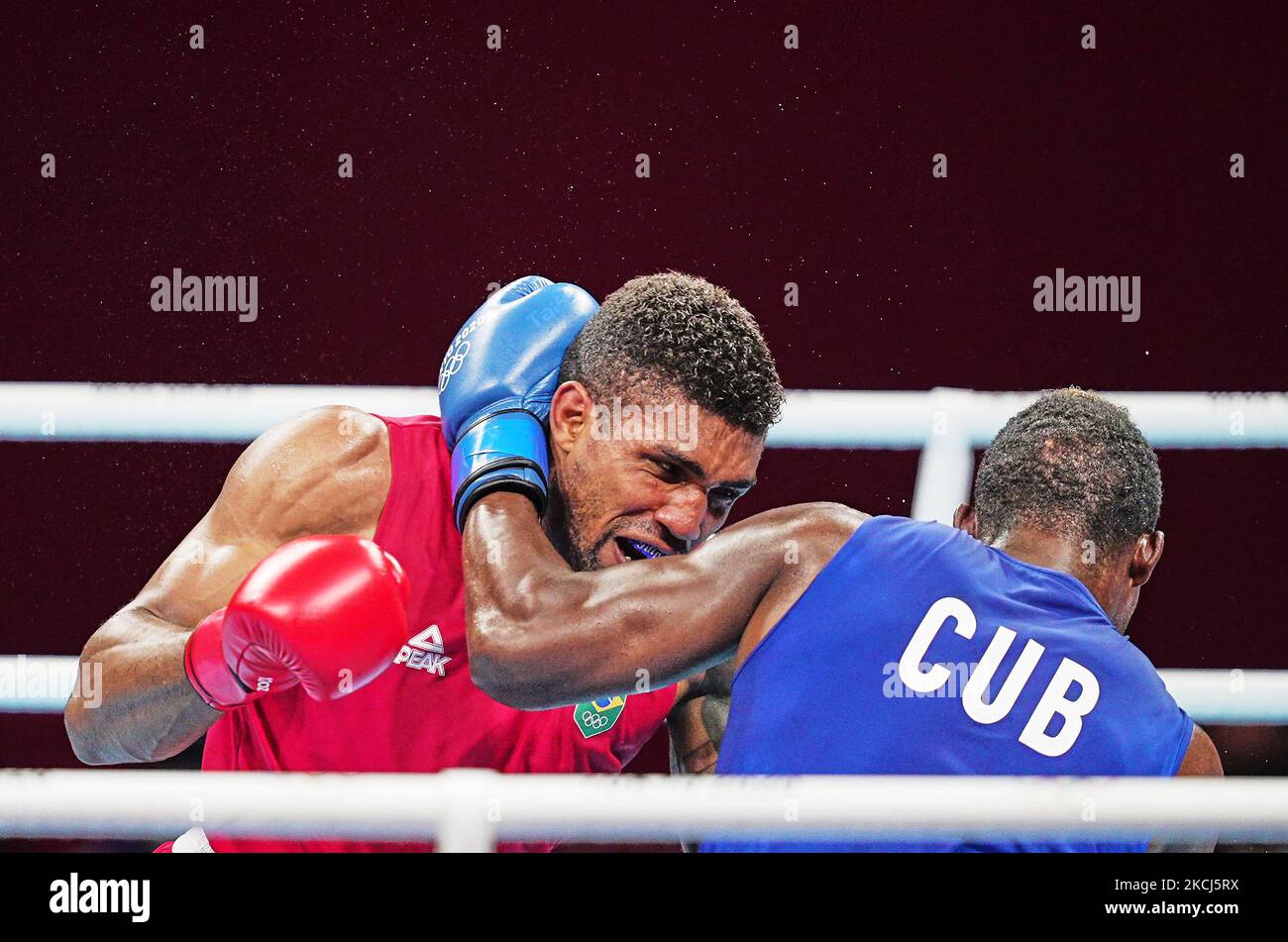 Julio La Cruz from Cuba and Abner Teixeira from Brazil during boxing at the Tokyo Olympics at ...