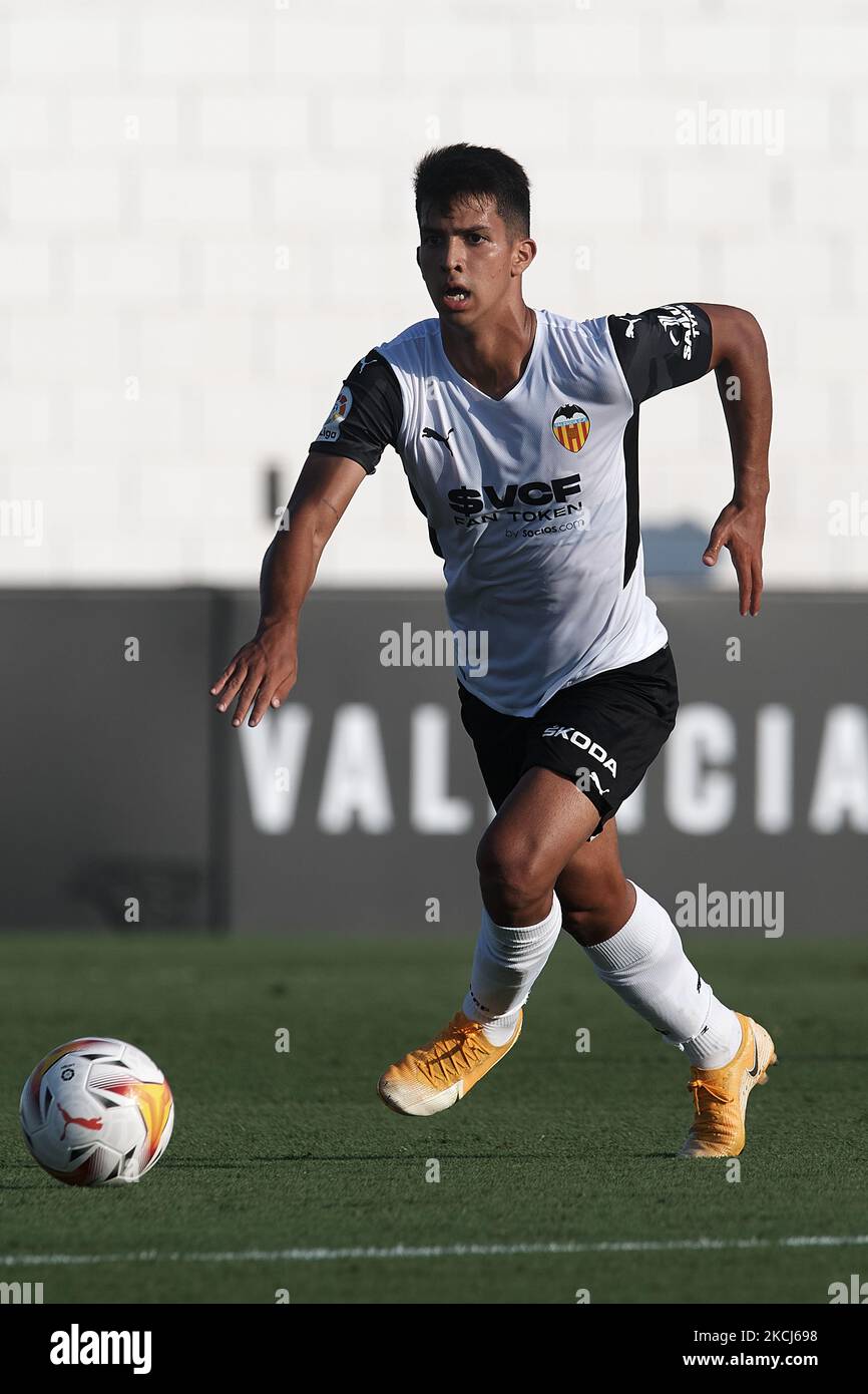 Alessandro Burlamaqui of Valencia runs with the ball during the pre-season friendly match ...