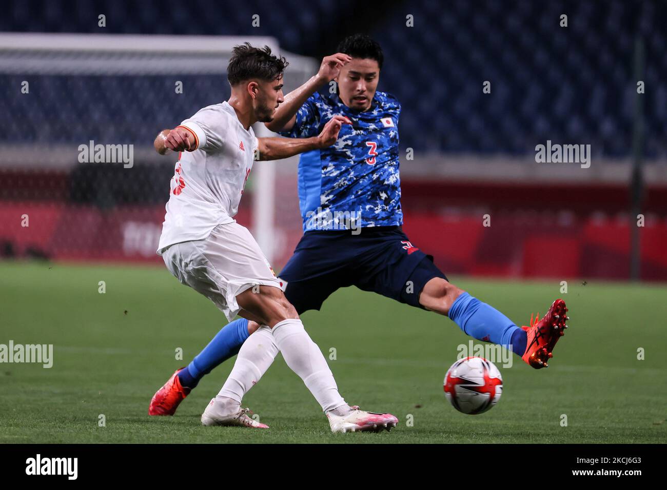 (3) Yuta NAKAYAMA of Team Japan competes for the ball with (19) Dani ...