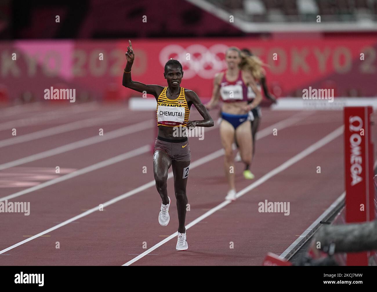 Peruth Chemutai winning 3000 meter steeplechase for women at the Tokyo ...