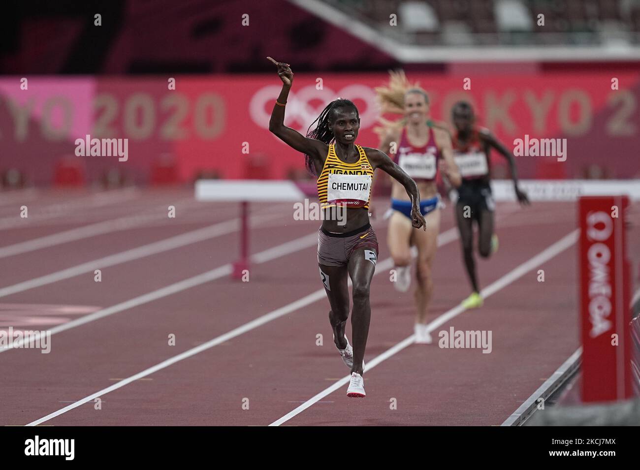 Peruth Chemutai winning 3000 meter steeplechase for women at the Tokyo ...