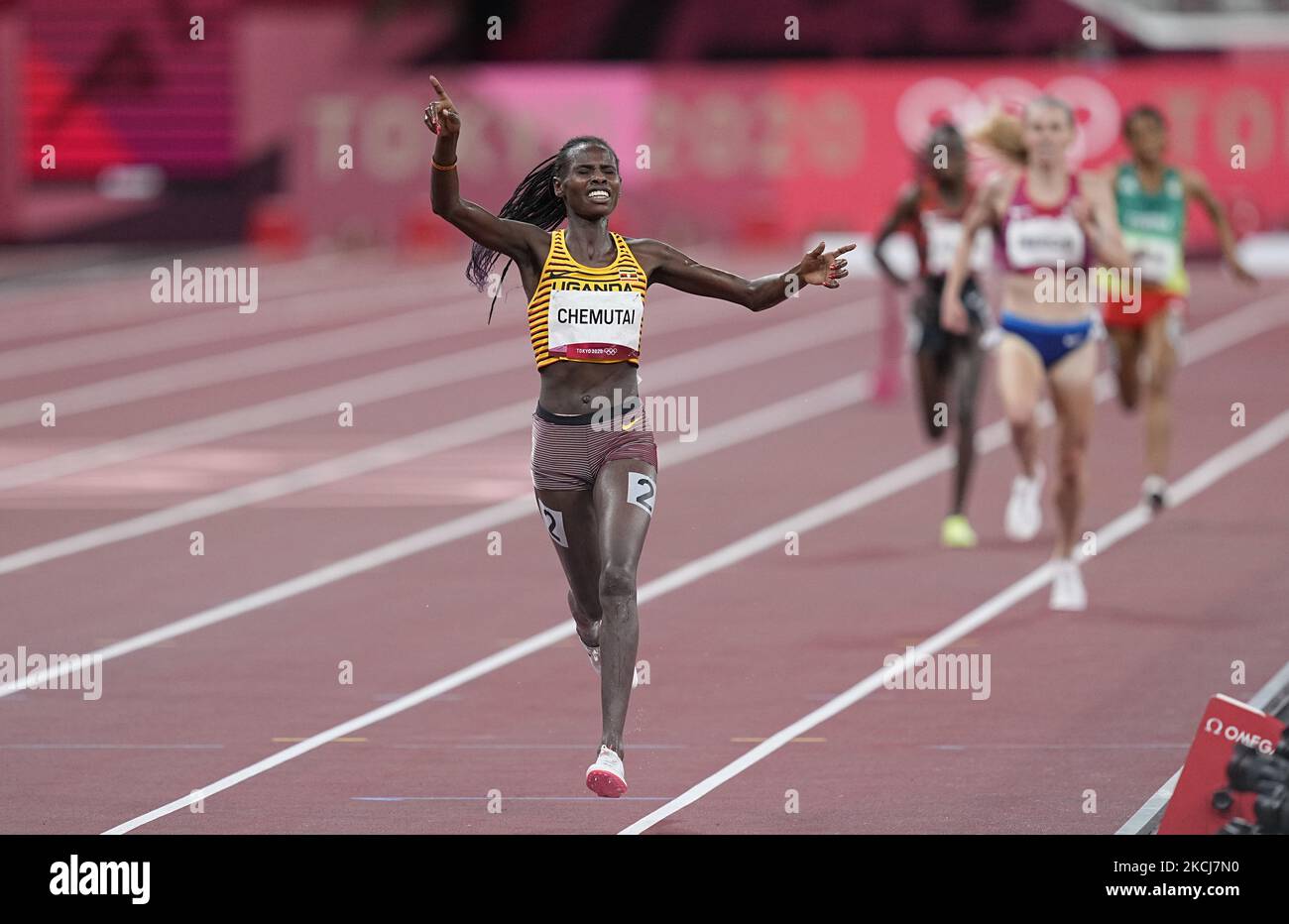 Peruth Chemutai winning 3000 meter steeplechase for women at the Tokyo ...