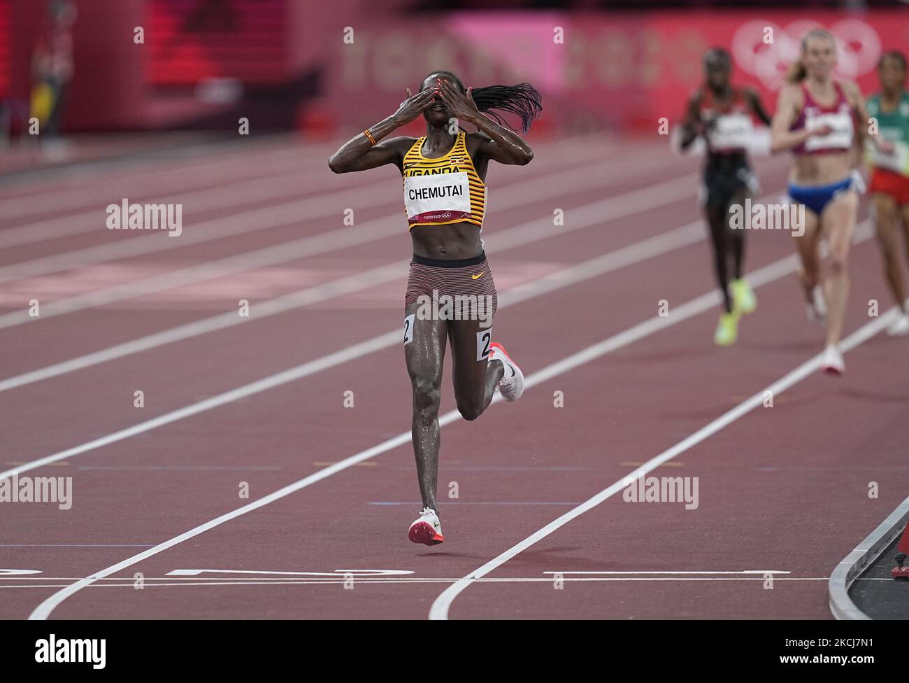 Peruth Chemutai winning 3000 meter steeplechase for women at the Tokyo ...