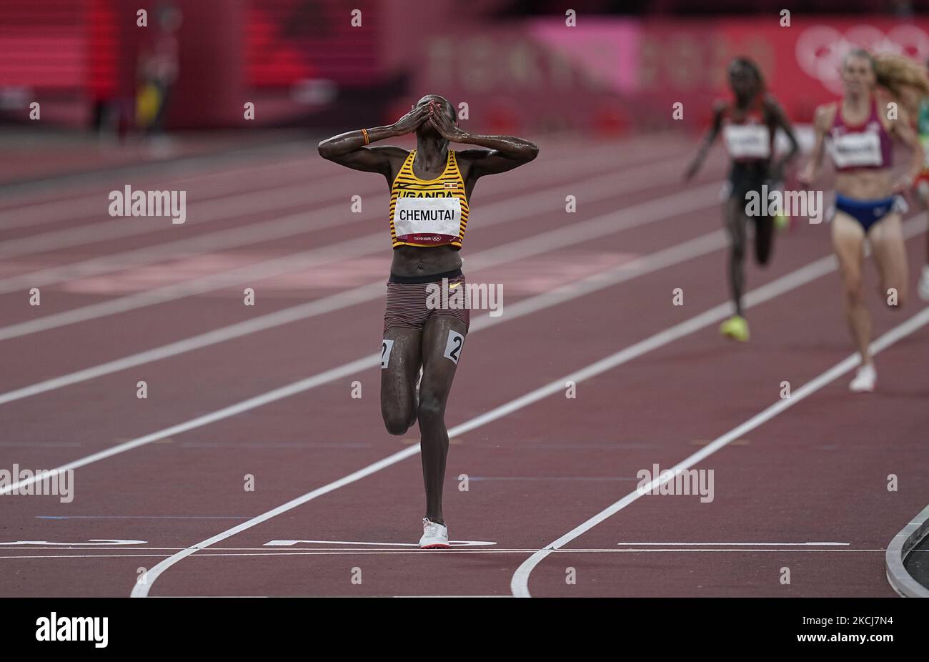 Peruth Chemutai winning 3000 meter steeplechase for women at the Tokyo ...