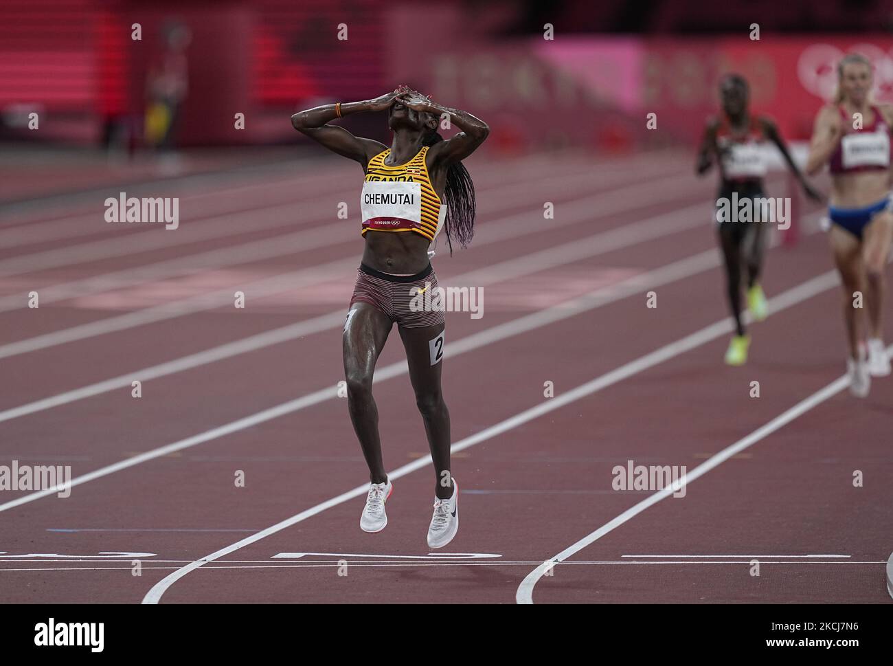 Peruth Chemutai winning 3000 meter steeplechase for women at the Tokyo ...