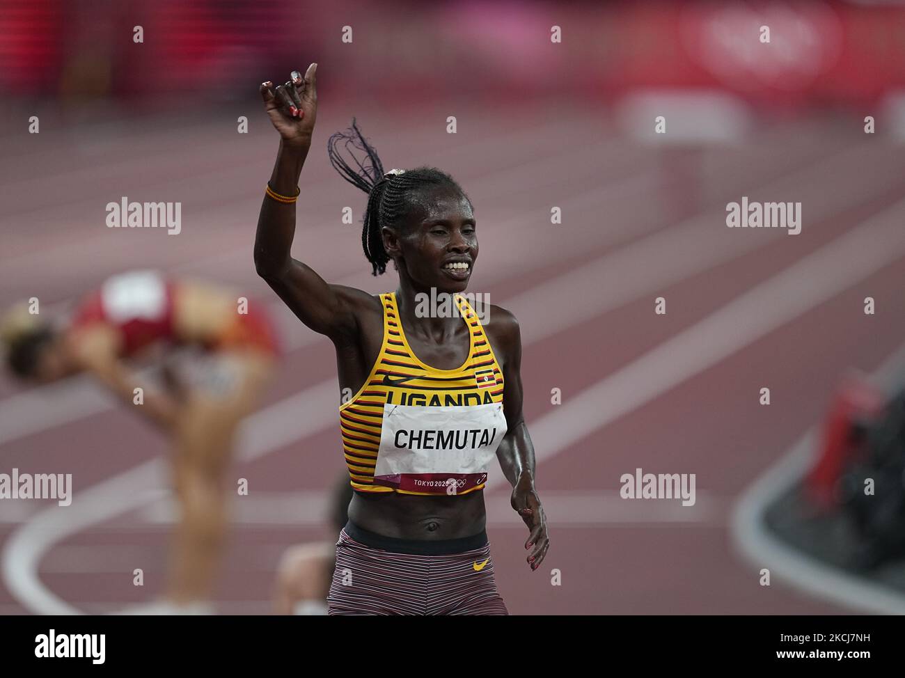 Peruth Chemutai winning 3000 meter steeplechase for women at the Tokyo ...