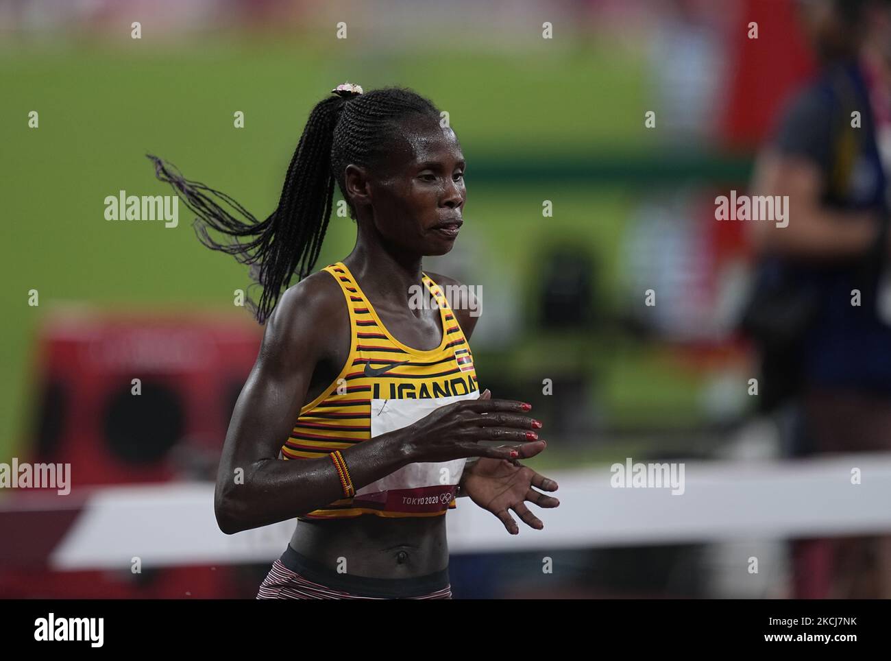 Peruth Chemutai winning 3000 meter steeplechase for women at the Tokyo ...