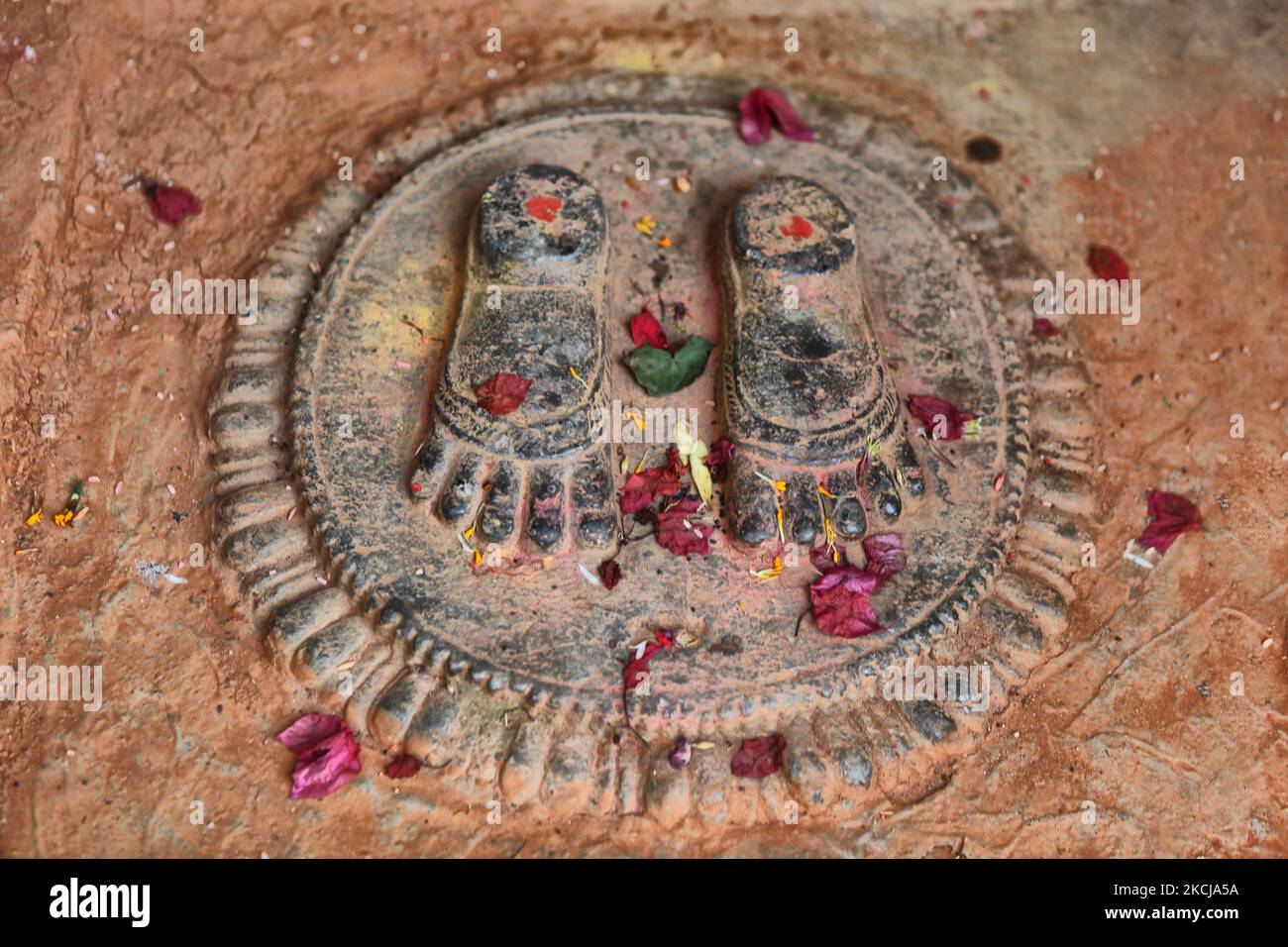 Paduka (the footprints of the Hindu god Shiva) at a small shrine at the ...