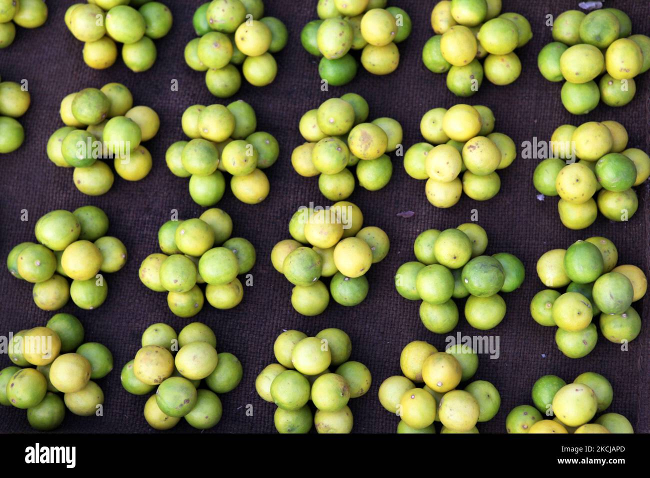 Limes and lemons displayed at the Shaniwaar Subzi Bazaar, which is the ...