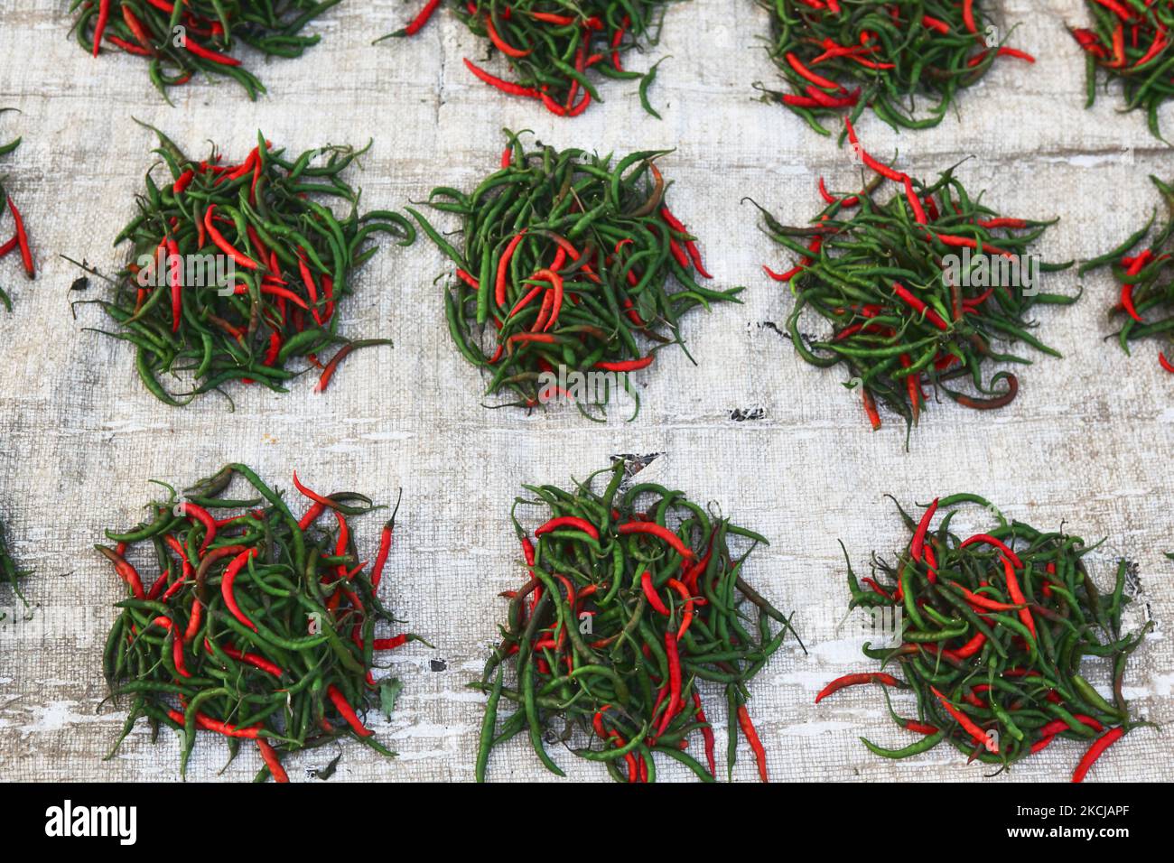 Chili peppers displayed at the Shaniwaar Subzi Bazaar, which is the ...