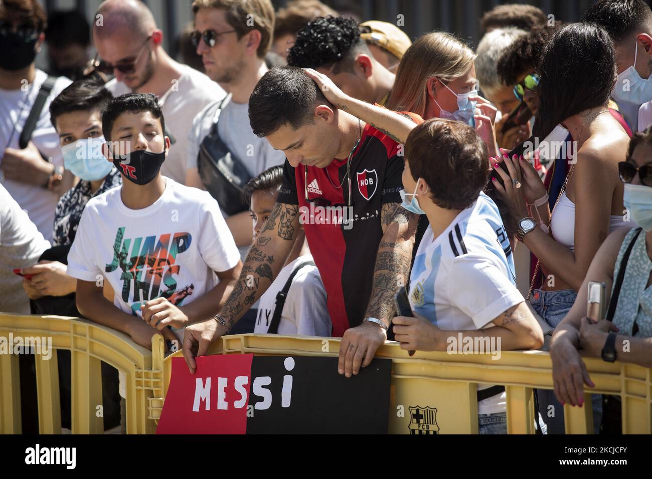 F.C. Barcelona fans gather out of the Barca stadium in Barcelona, Spain ...