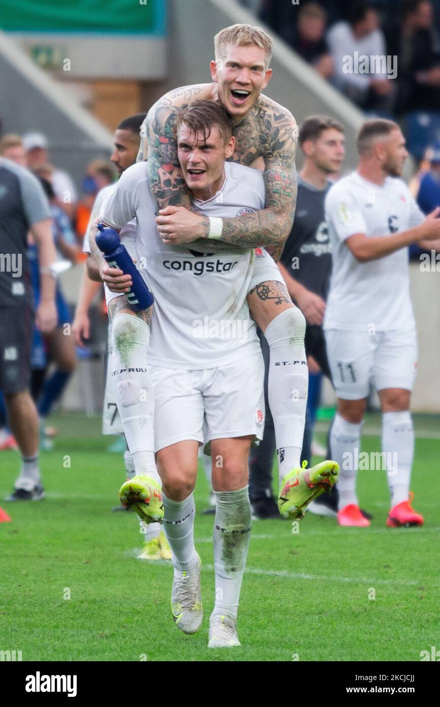 Eric Smith and Simon Makienok of FC St. Pauli celebrate following their ...