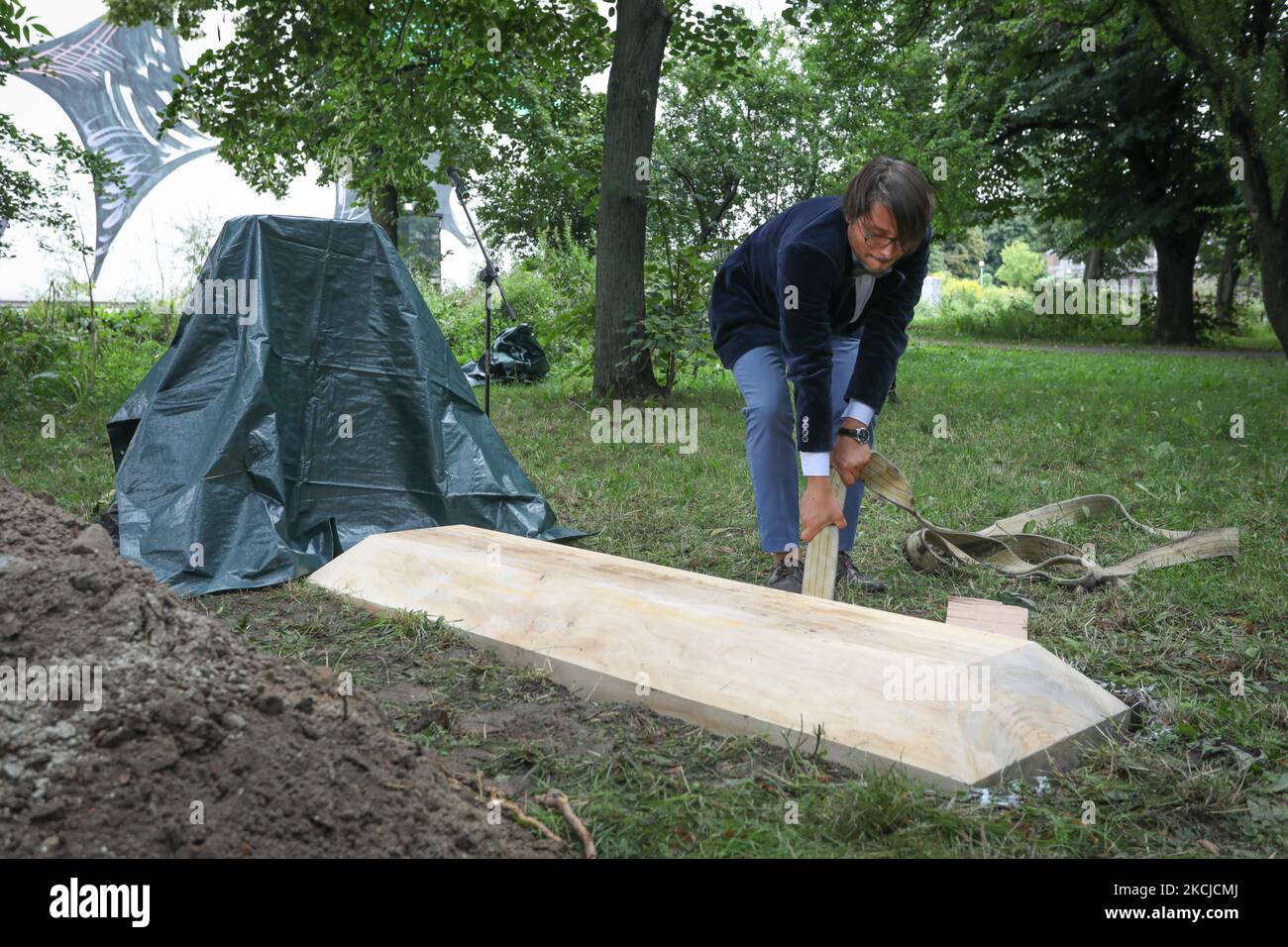 Artist Robert Sosnowski is seen preparing his exhibition "Tree Burial ...