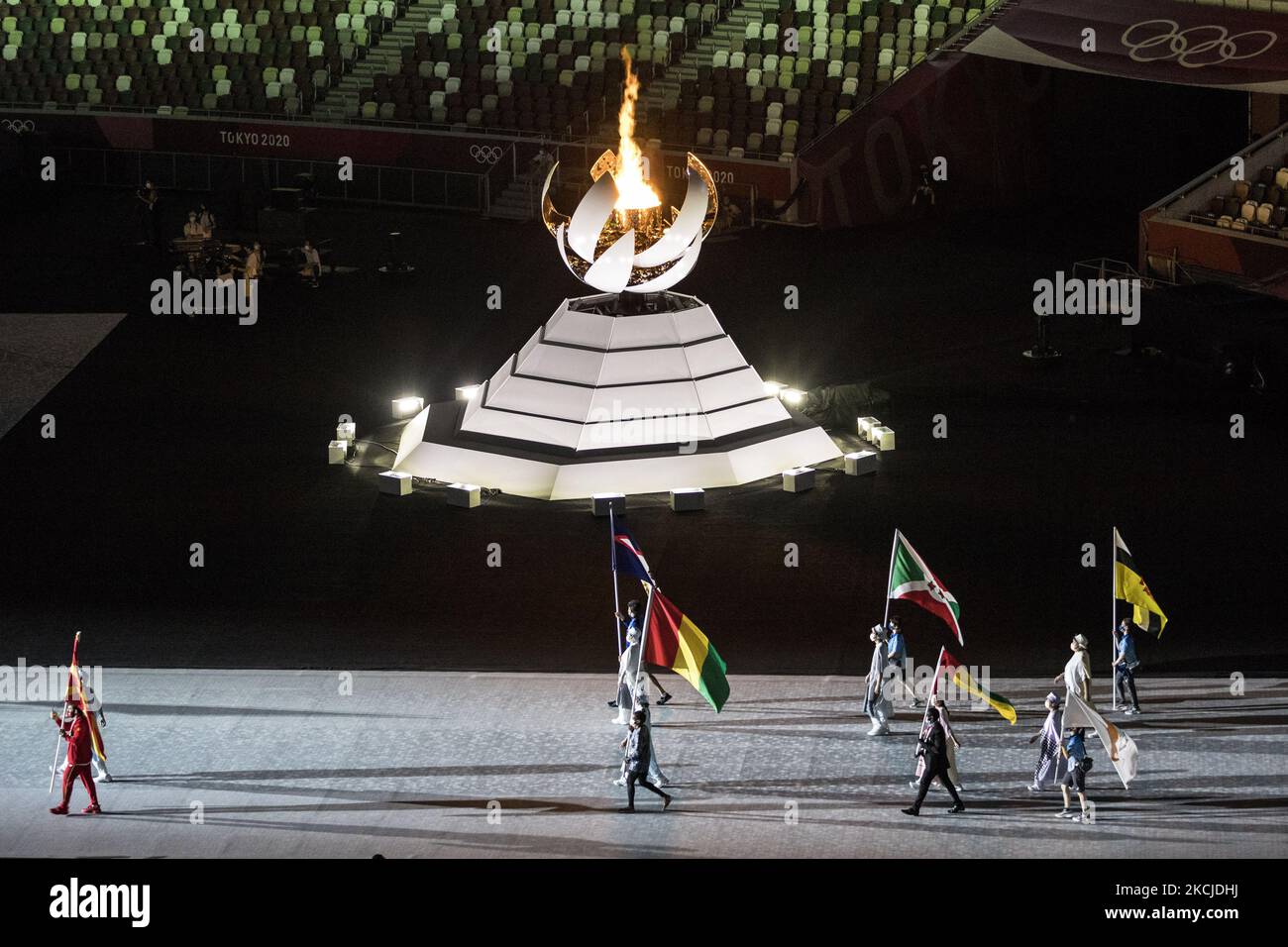 Closing ceremony in the Olympic Stadium. the flags through the stadium ...