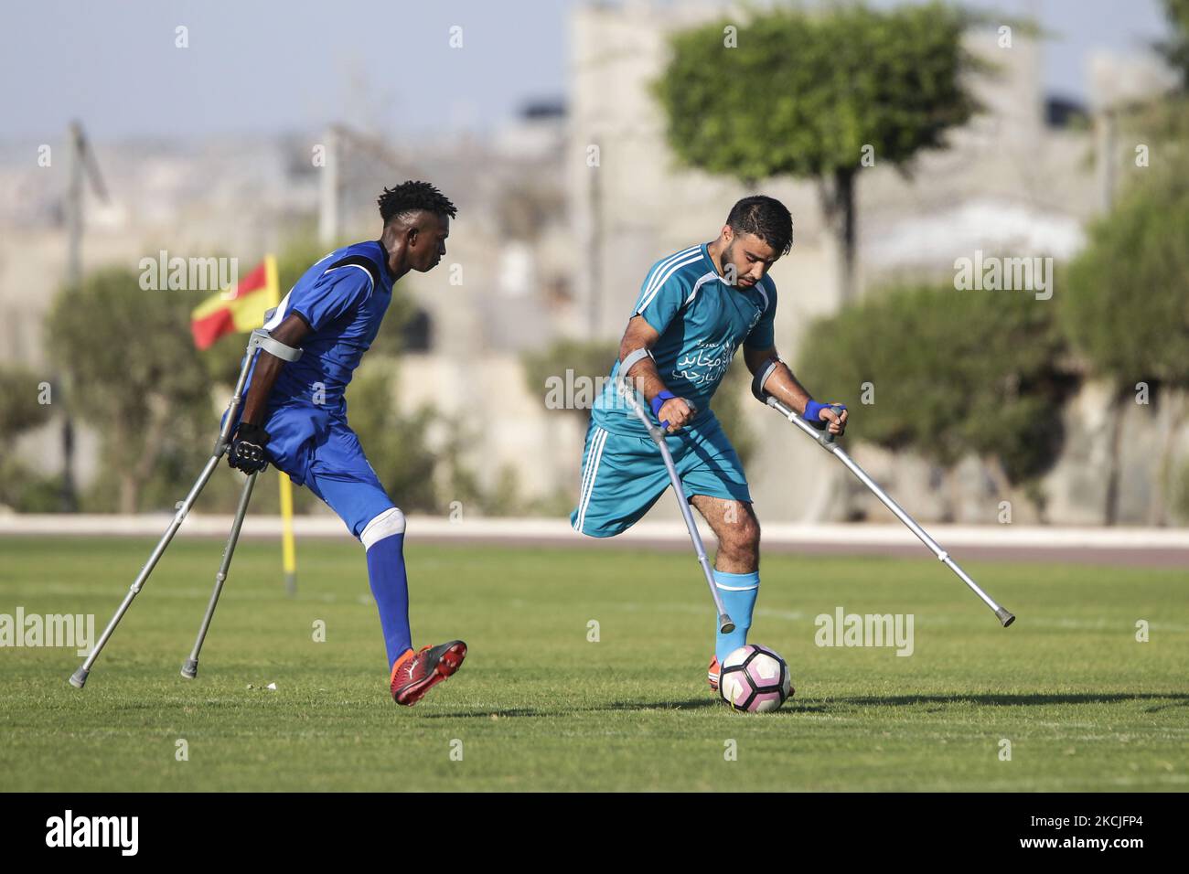 Palestinian amputee soccer players take part in a league match for ...
