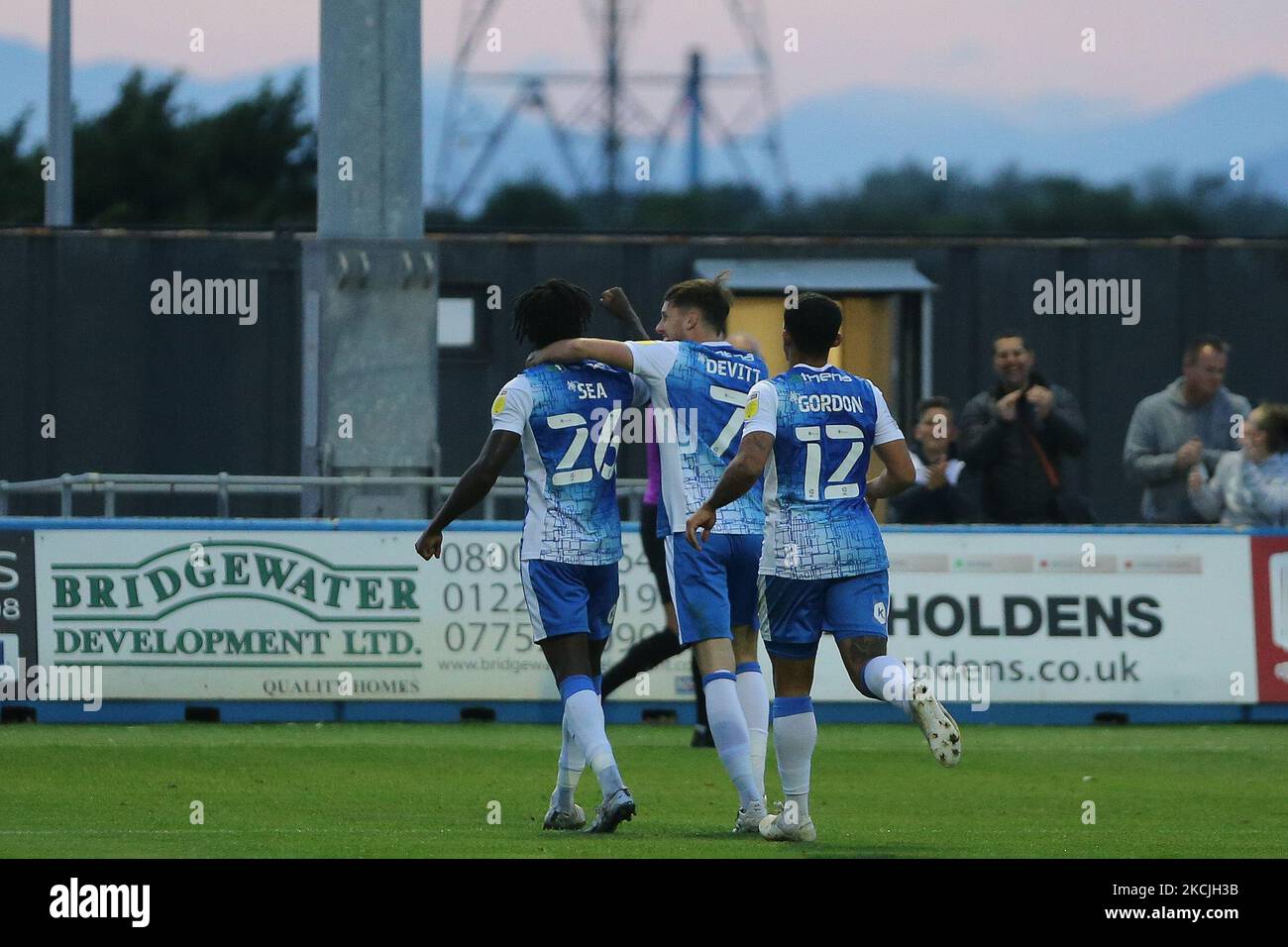 Barrow's Dimitri Sea celebrates with Jamie Devitt and Josh Gordon after ...