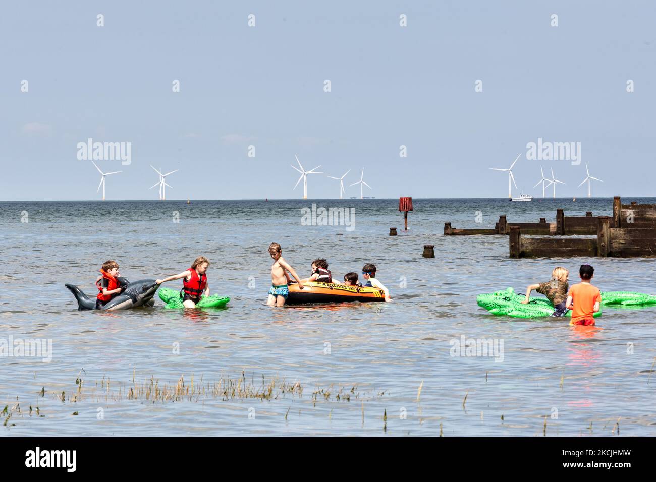 Holidaymakers enjoy sunny summer day at the beach in Whitstable, south ...