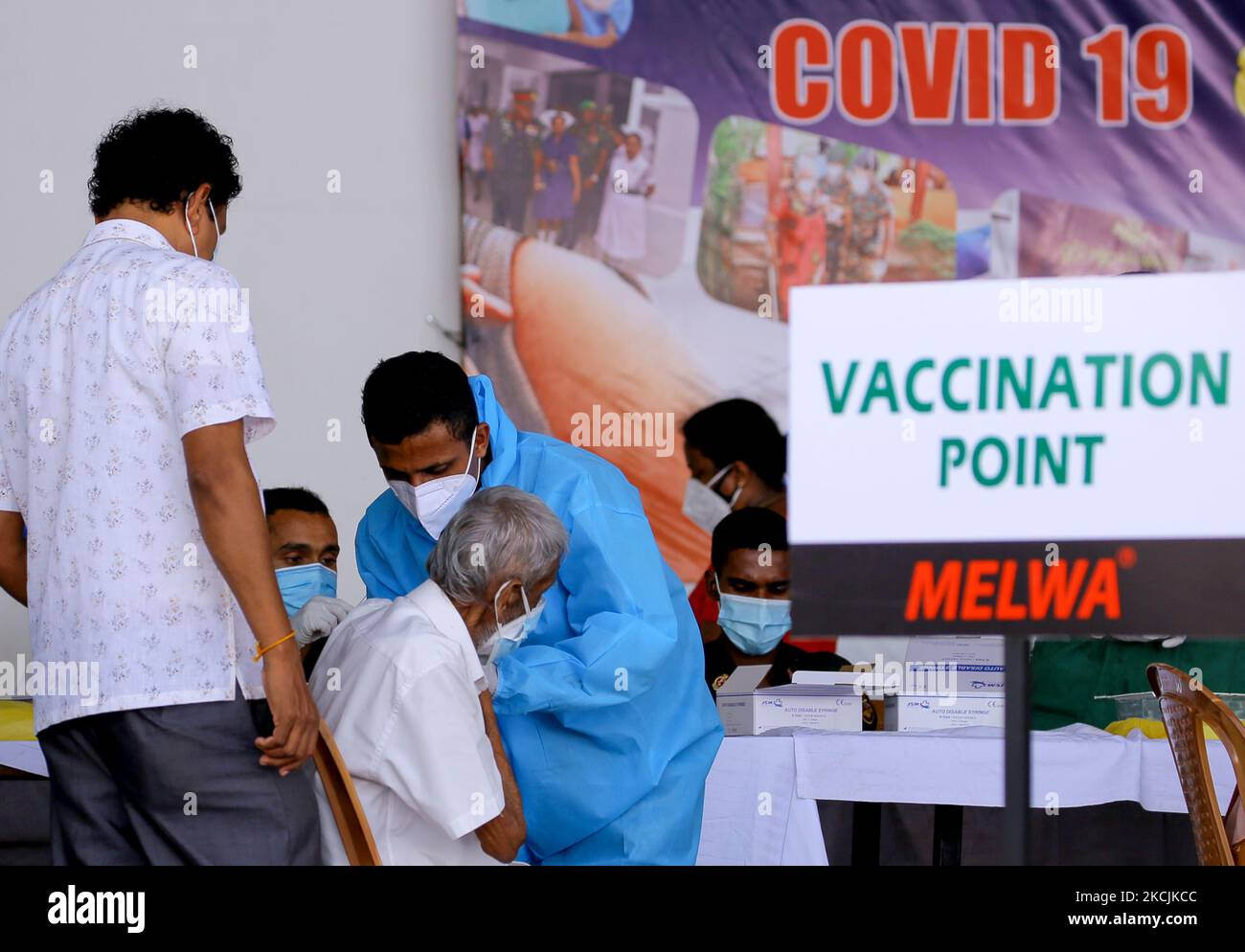 Sri Lankans Receive Jabs Of The Chinese Made Sinopharm Vaccine At A