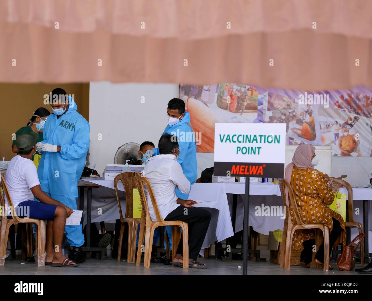 Sri Lankans Receive Jabs Of The Chinese Made Sinopharm Vaccine At A