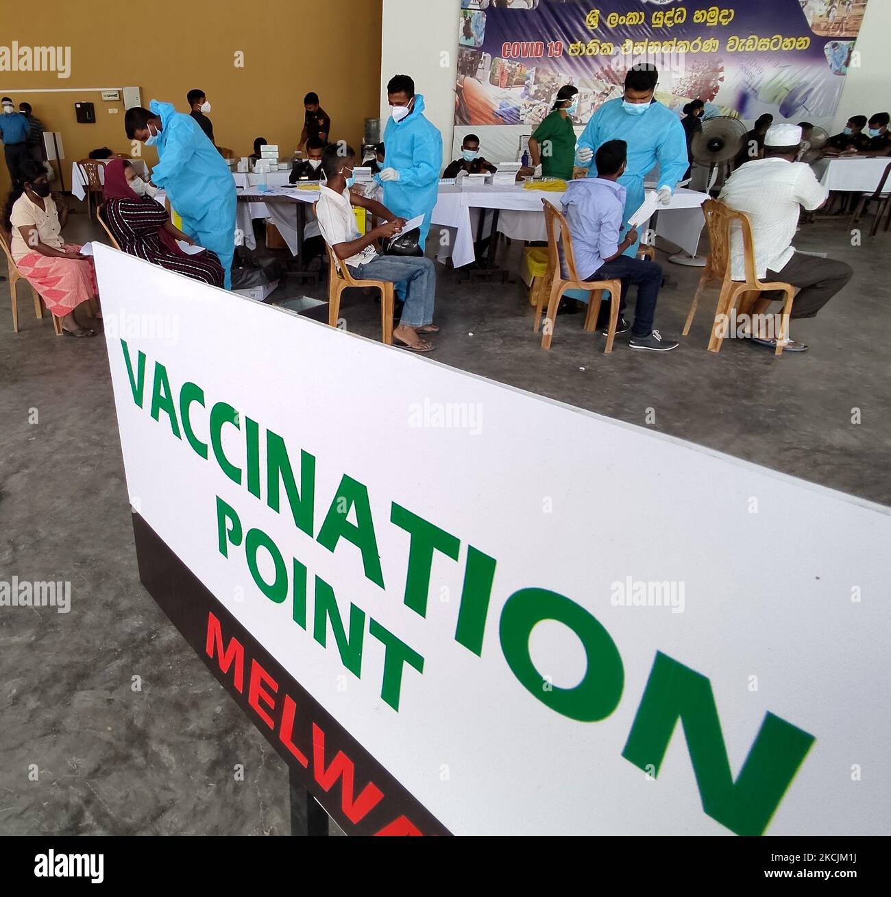 Sri Lankans Receive Jabs Of The Chinese Made Sinopharm Vaccine At A