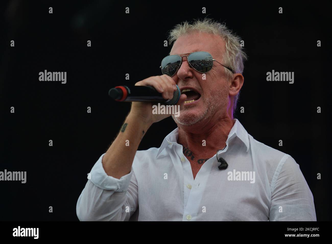 Glass Tiger lead singer Alan Frew performs on stage during Edmonton ...