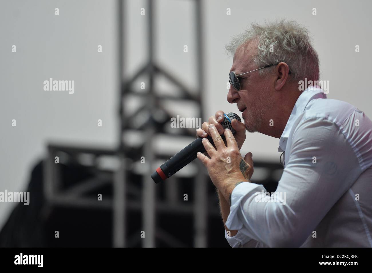 Glass Tiger lead singer Alan Frew performs on stage during Edmonton ...