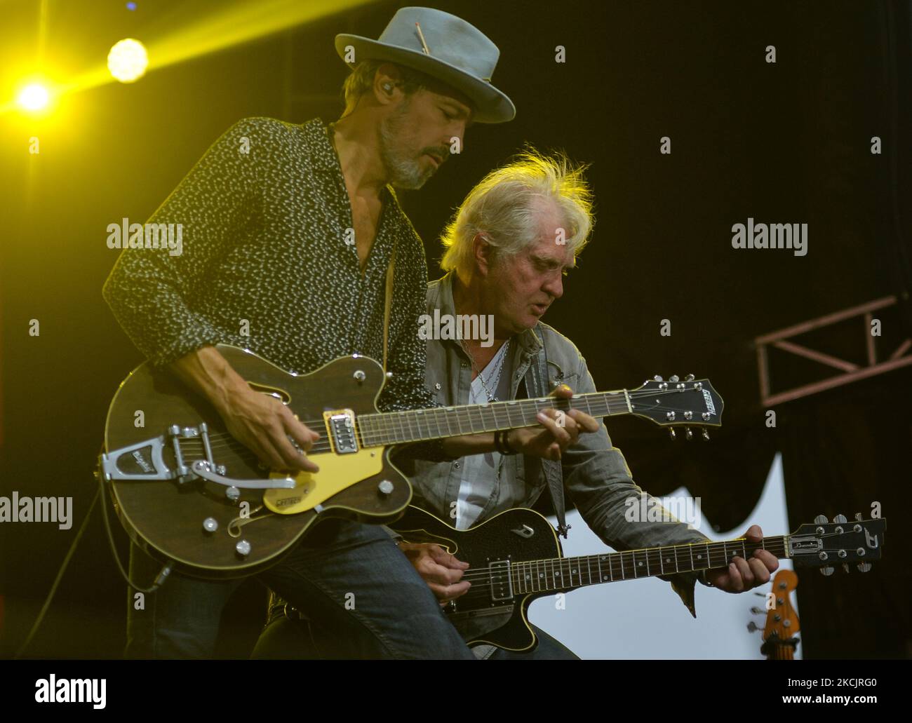 Canadian musician Tom Cochrane (center) and guitarist Bill Bell (left ...