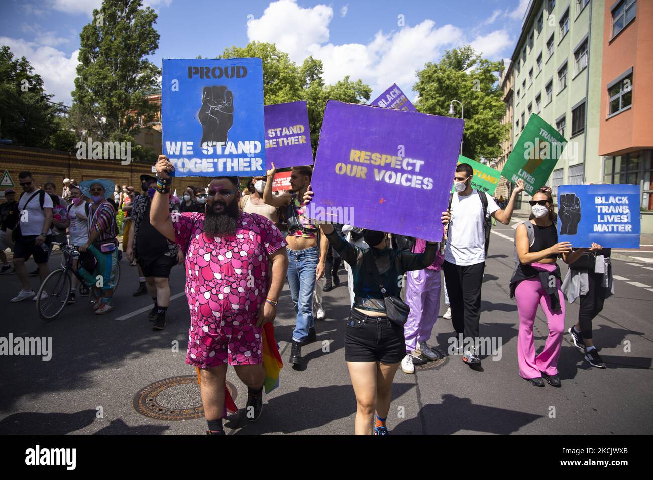 People attend the Trans Pride March in Berlin on July 10, 2021. (Photo ...