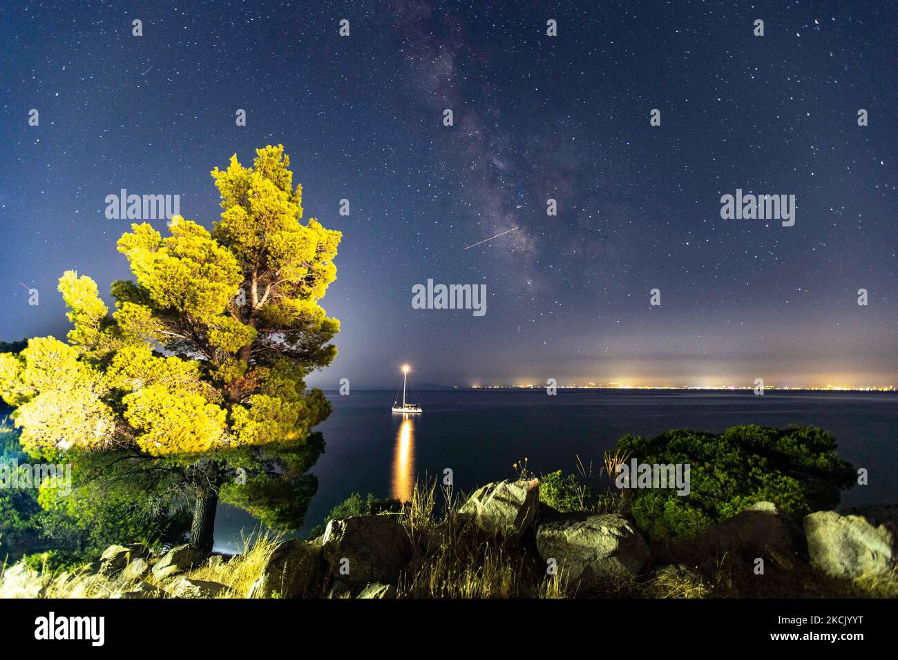 The Milky Way in the dark Greek night sky with the illuminating stars ...