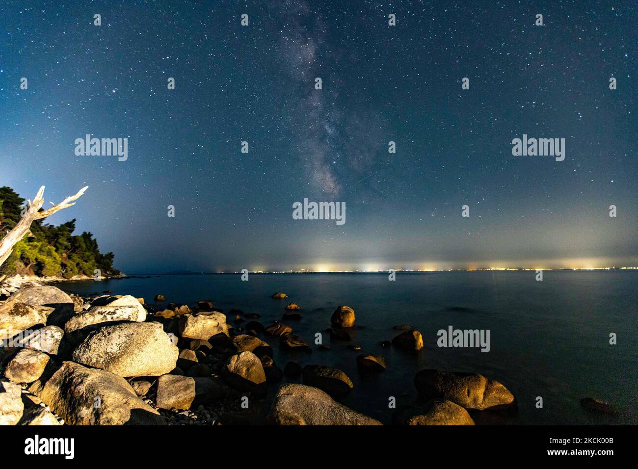 The Milky Way in the dark Greek night sky with the illuminating stars ...