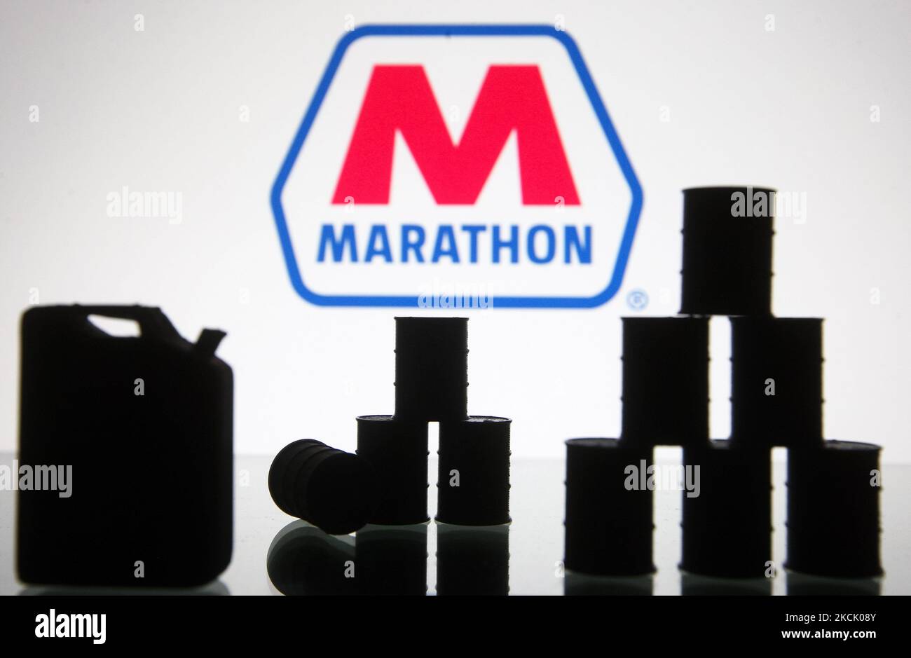 Marathon Petroleum Corporation logo and models of a fuel ?an and oil ...