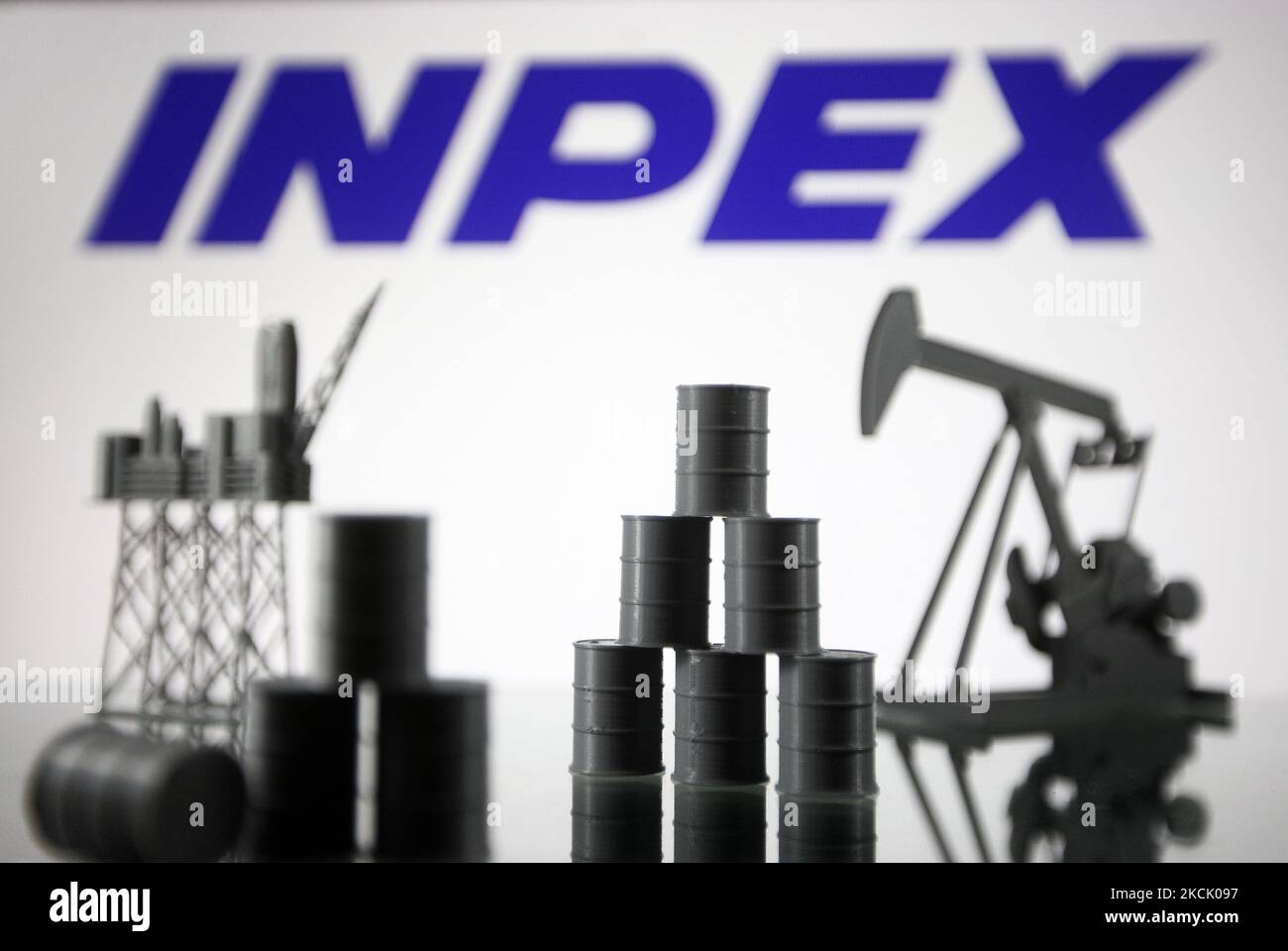 INPEX Corporation logo and models of an oil rig, pump jack and oil ...