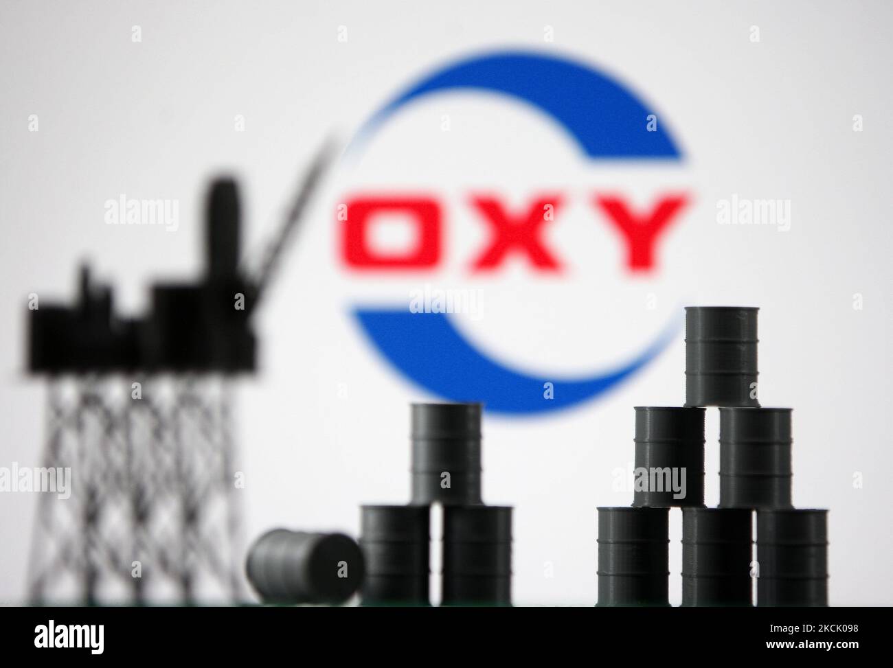Occidental Petroleum Corporation (OXY) logo and models of an oil rig ...