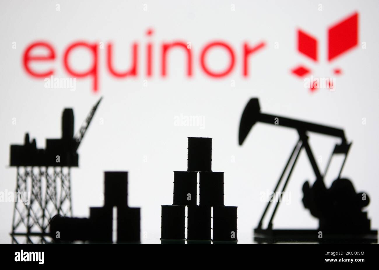 Equinor ASA logo and models of an oil rig, pump jack and oil barrels ...