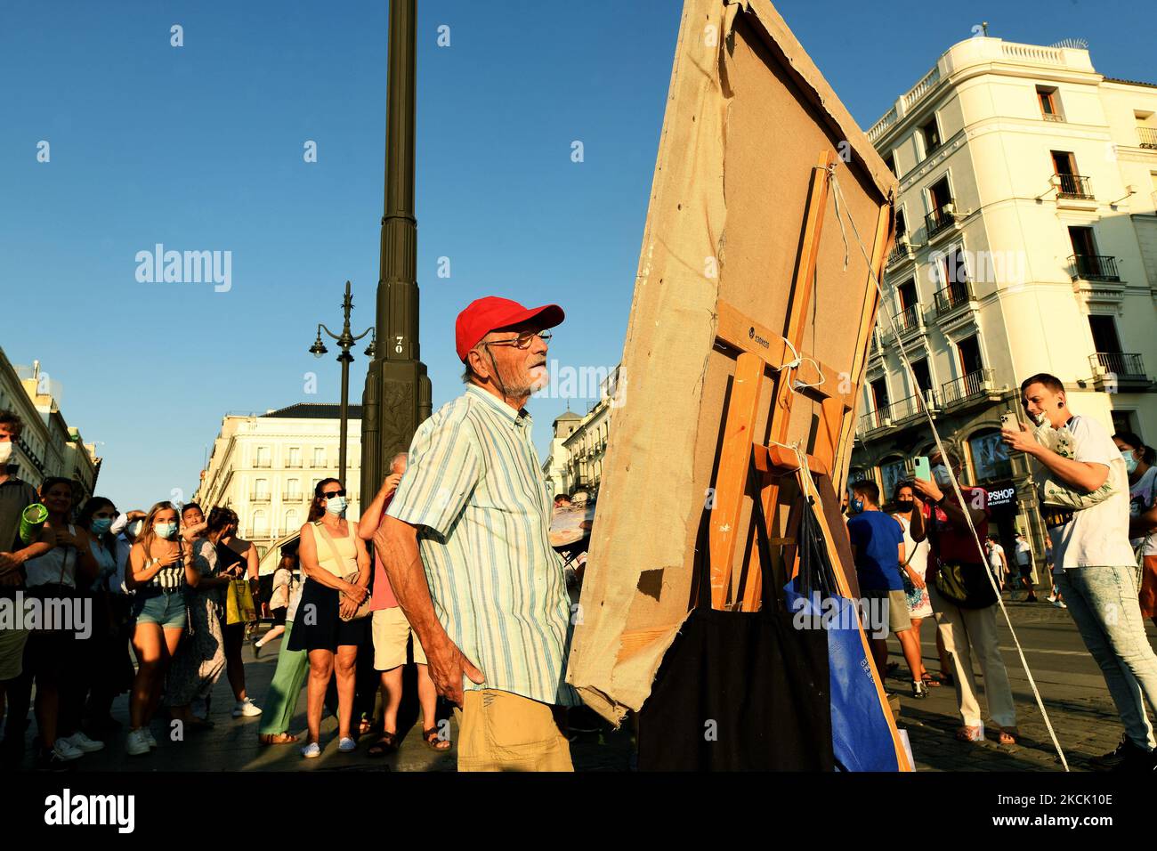 Spanish artist Antonio Lopez works during a session to paint the famous ...
