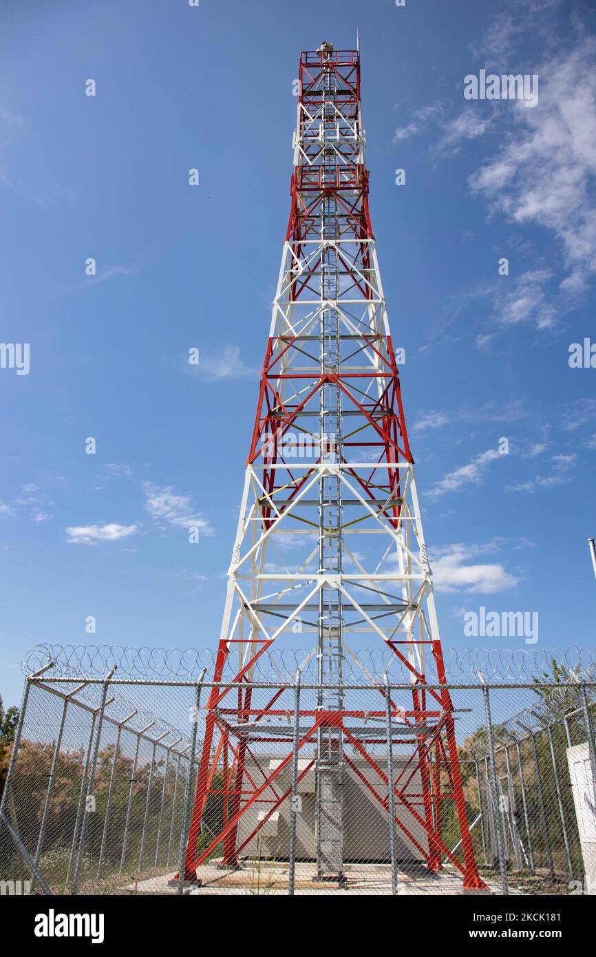 TA police car infront of the new towers equiped with zoom cameras ...
