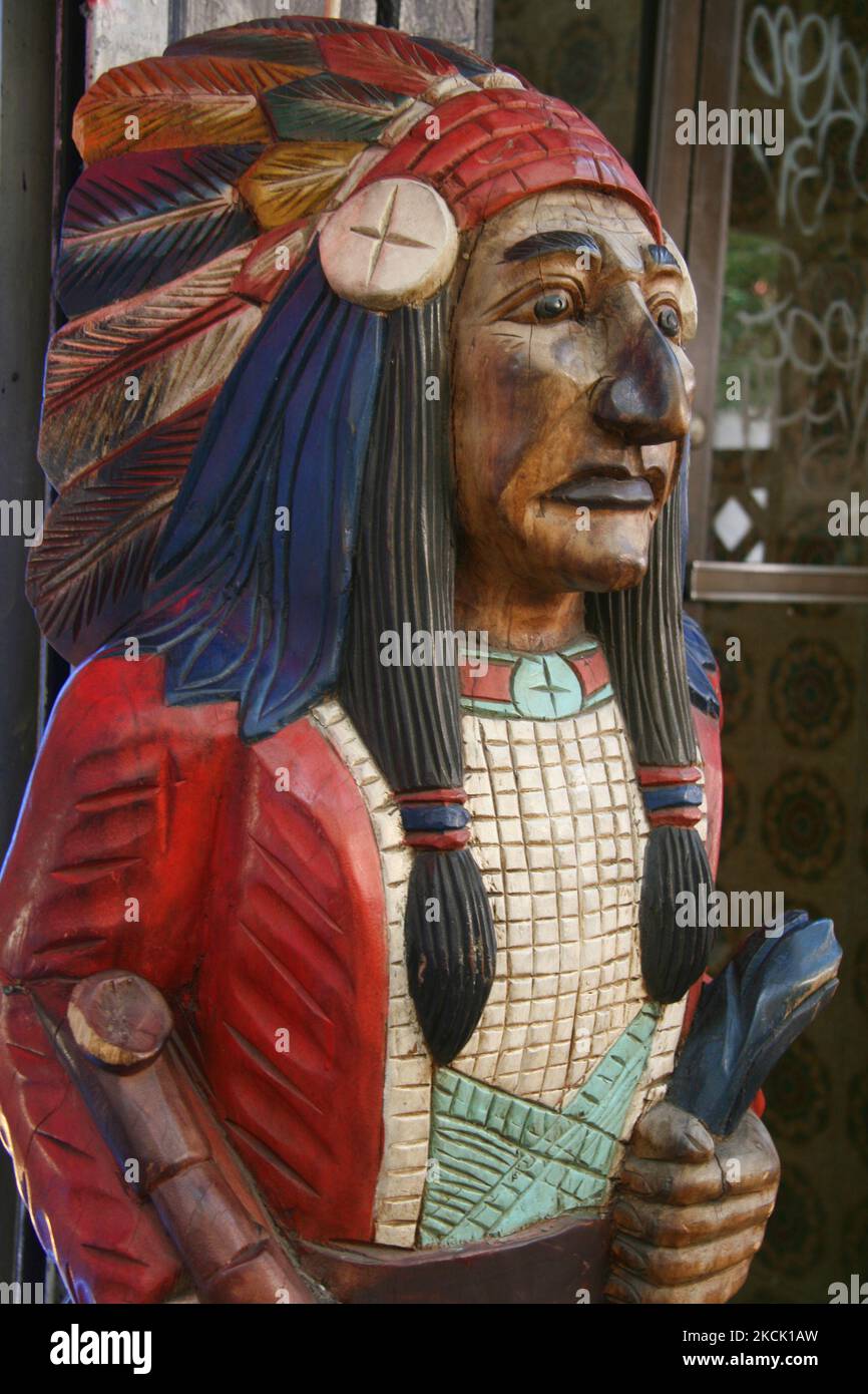 Detail of a large wooden cigar store Indian outside a tobacco shop in ...