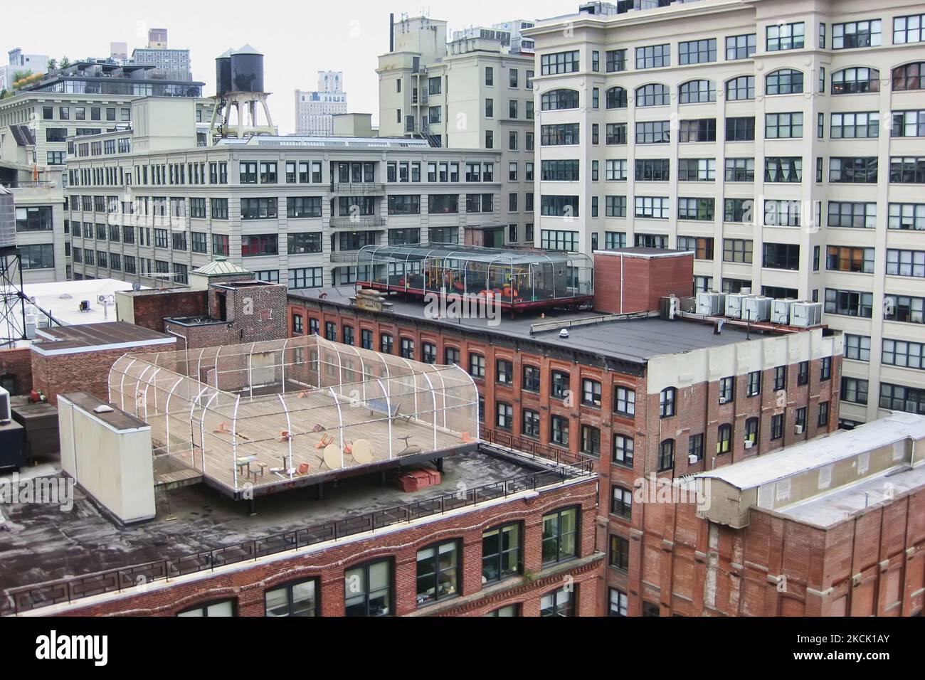 Rooftop playgrounds offer children a safe play space on top of large ...