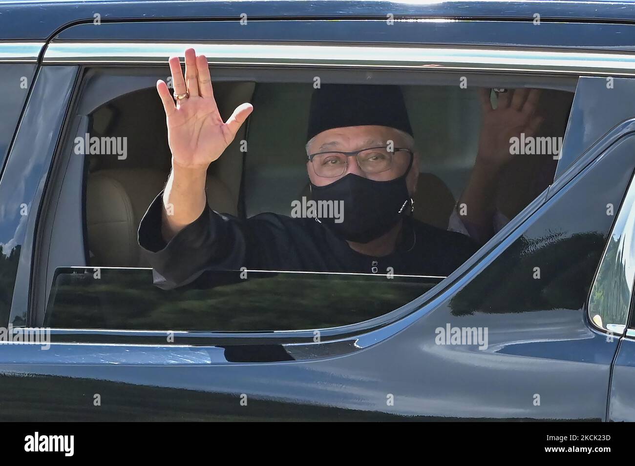 Malaysia's newly appointed prime minister Ismail Sabri Yaakob, waves to ...