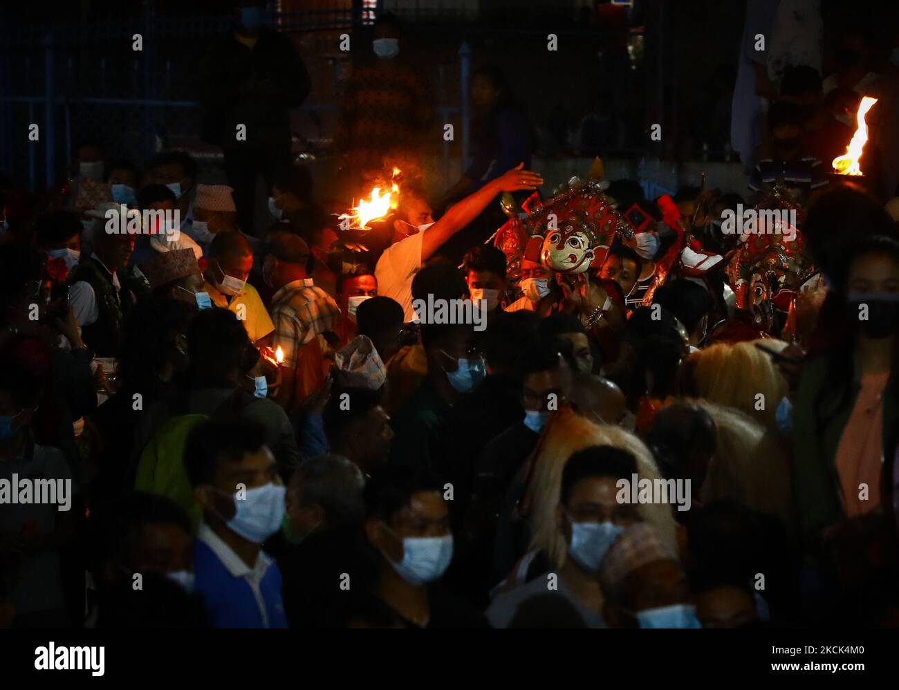 A masked dancer takes part in the Nil Barahi mask dance festival in ...