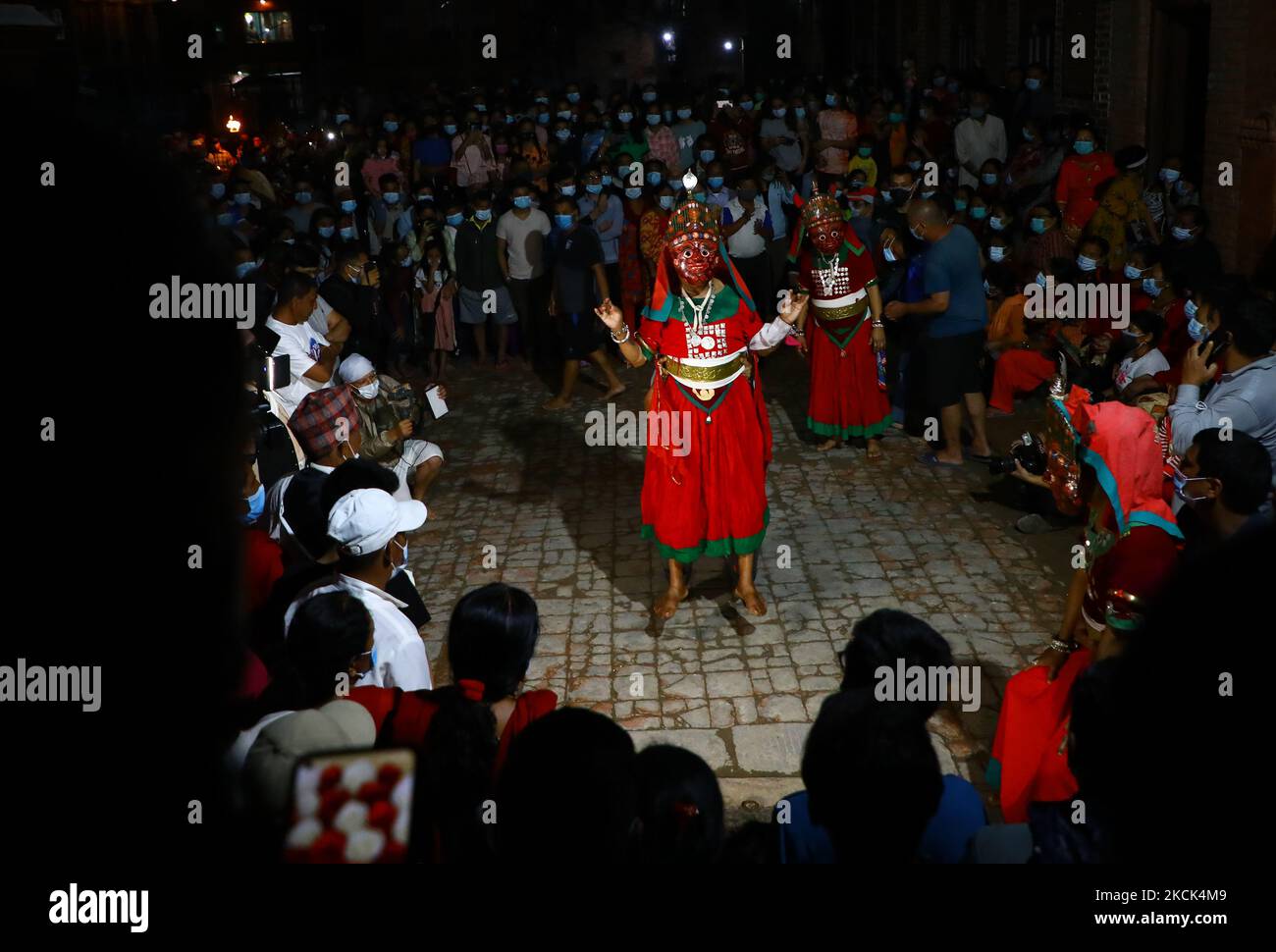 A masked dancer takes part in the Nil Barahi mask dance festival in ...