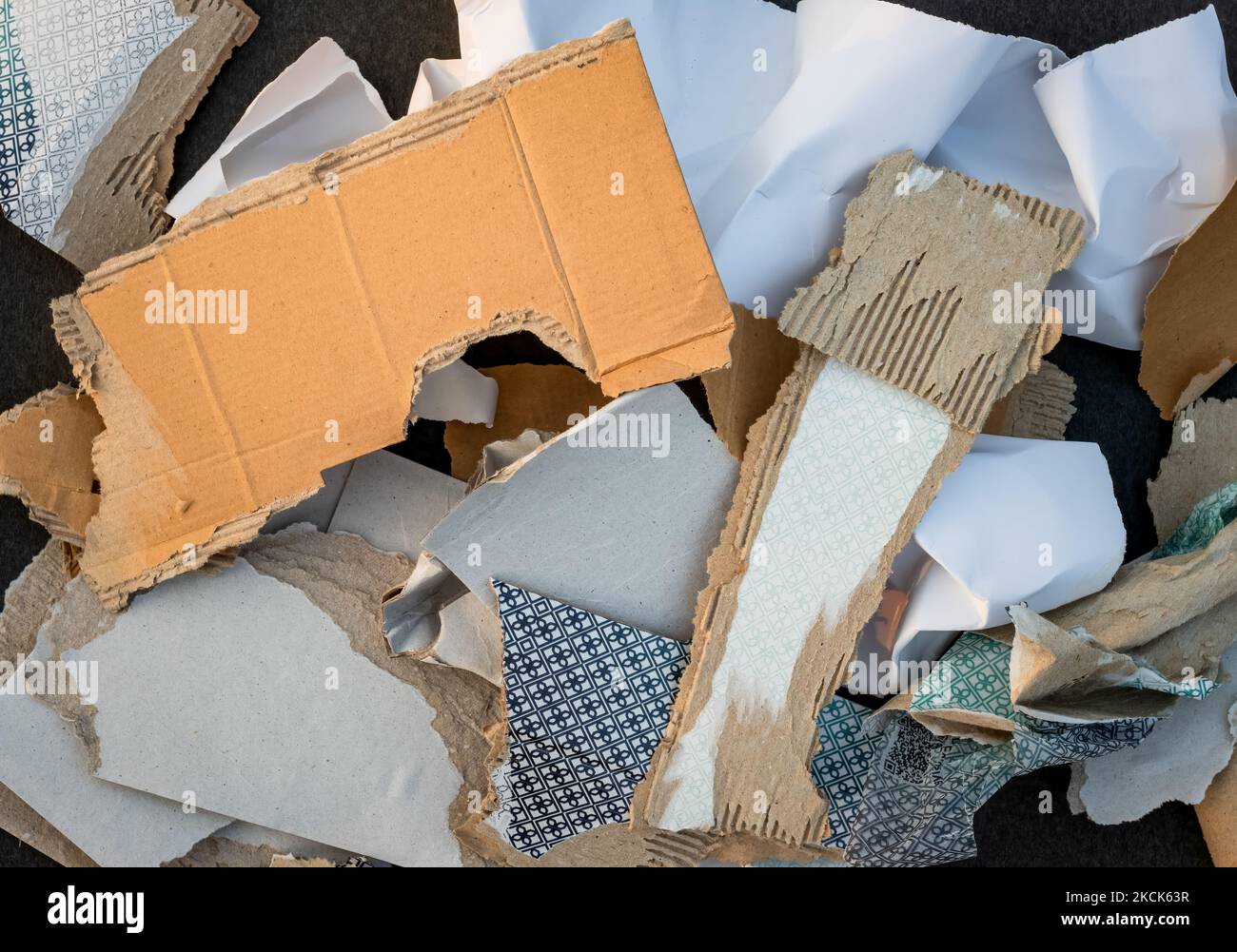 A pile of cardboard scrap papers close up top view Stock Photo - Alamy