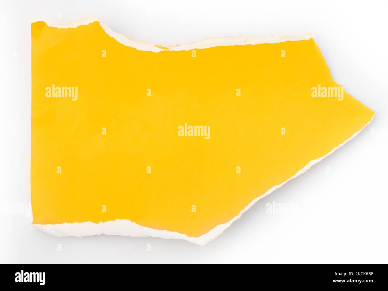 Yellow scrap paper with torn edge on white background Stock Photo - Alamy
