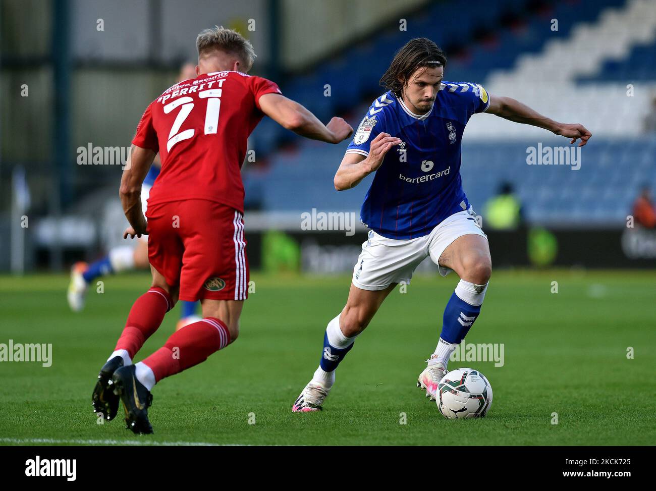 Oldham Athletic's Samuel Hart tussles with Harry Perritt of Accrington ...