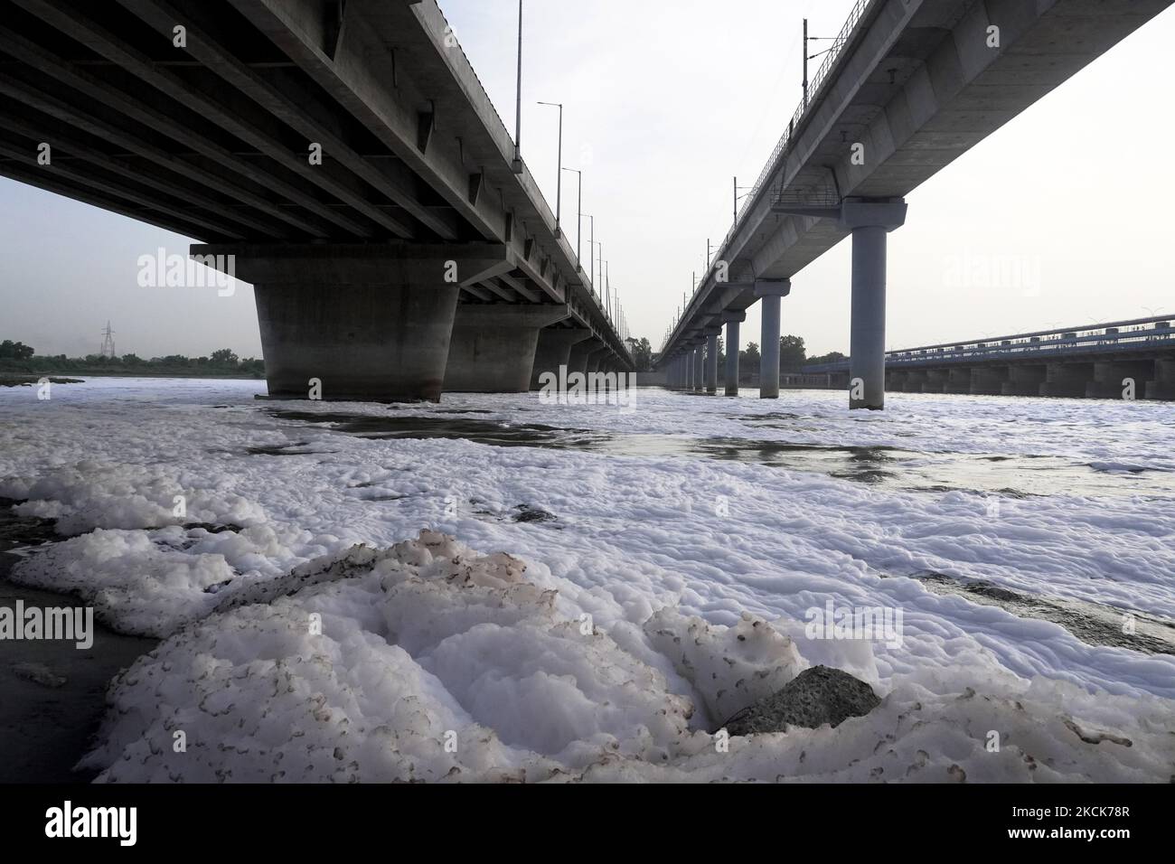 A general view shows the polluted water of Yamuna river covered with ...