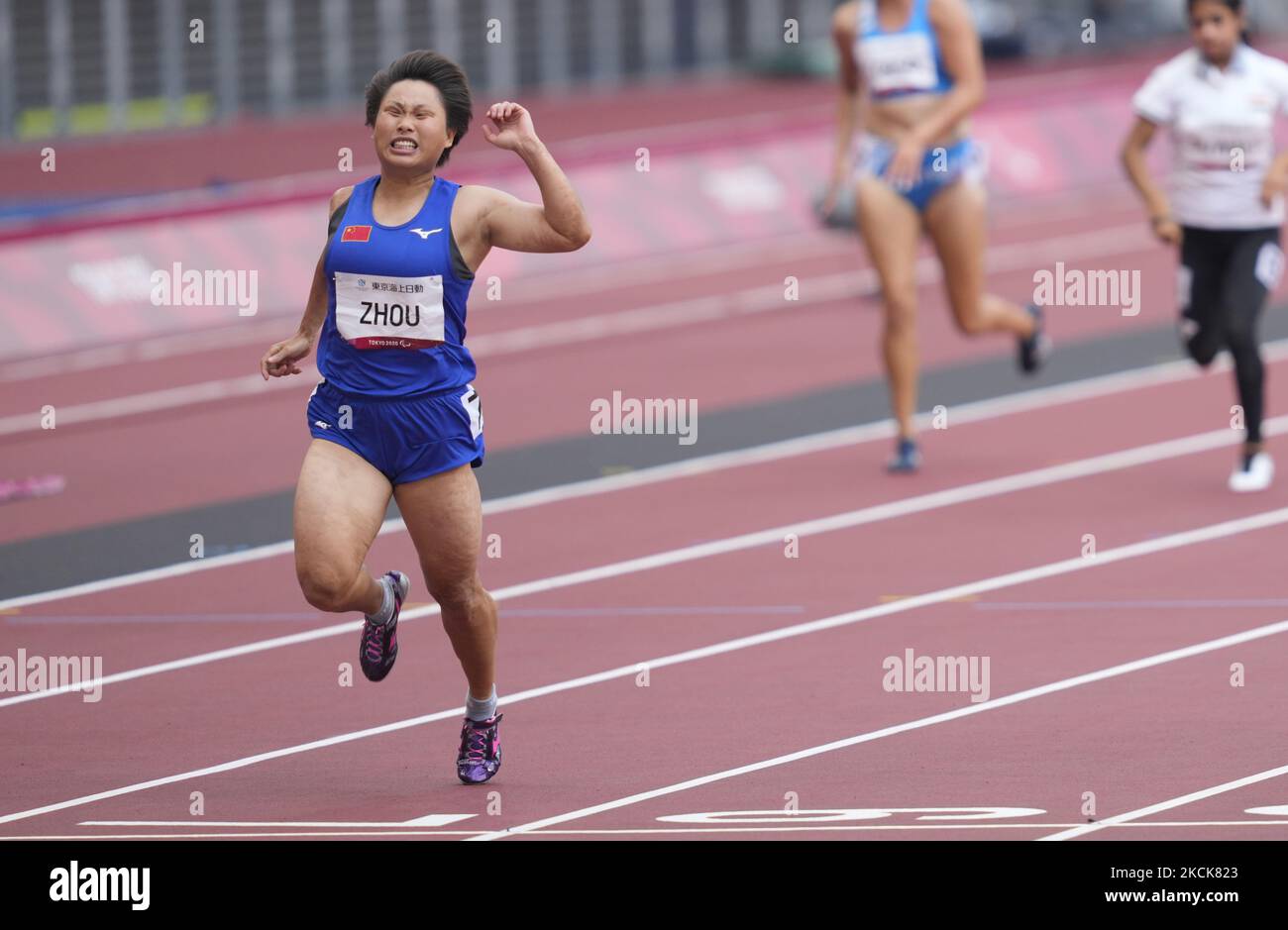 Xia Zhou from China winning gold at 100m during athletics at the Tokyo ...