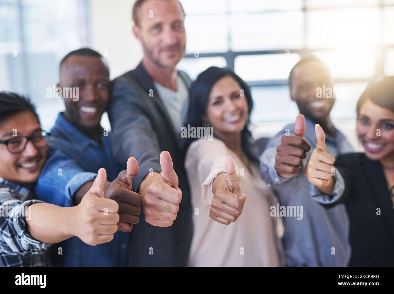 Thats a job well done. Portrait of a group of happy creative colleagues ...